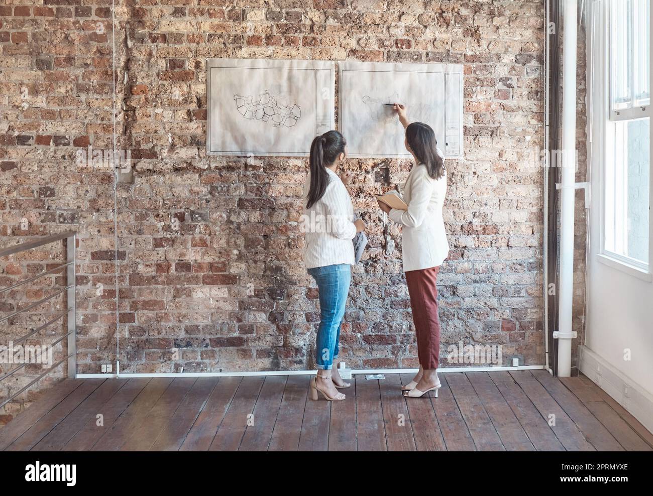 Creative designer, architect and engineer in meeting for construction ...