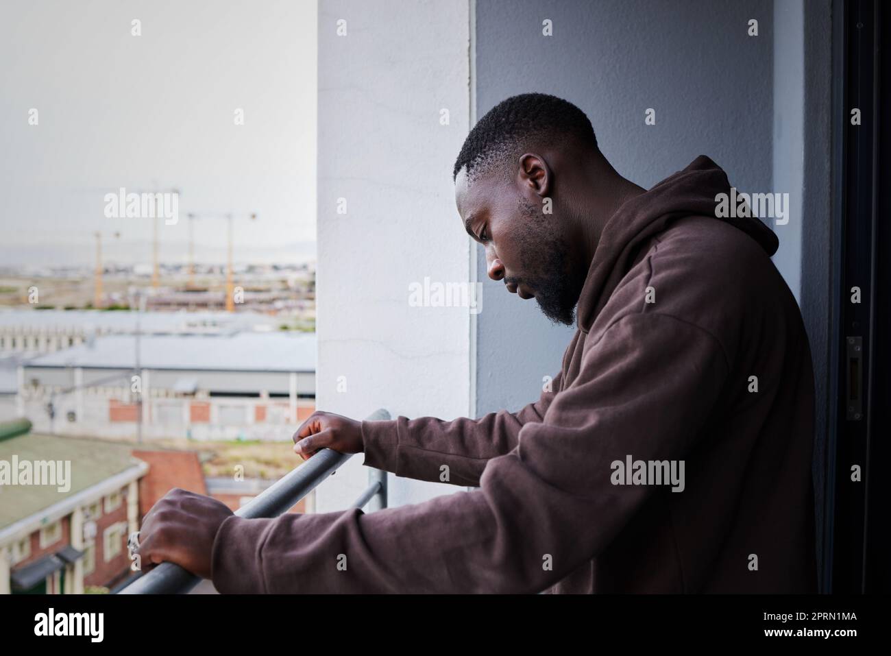 Black man on balcony hi-res stock photography and images - Alamy