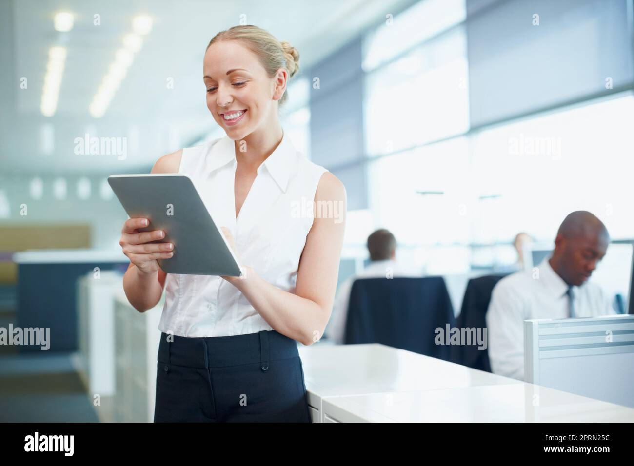 Business woman using electronic PC. Beautiful business woman using ...
