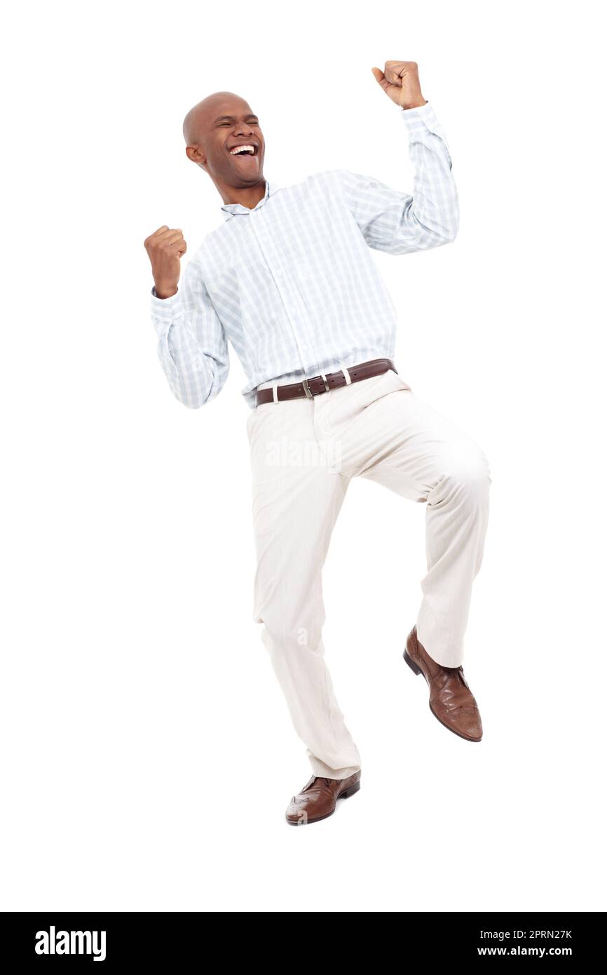 Carefree celebration. Full length studio shot of a young african ... Carefree celebration. Full length studio shot of a young african ...