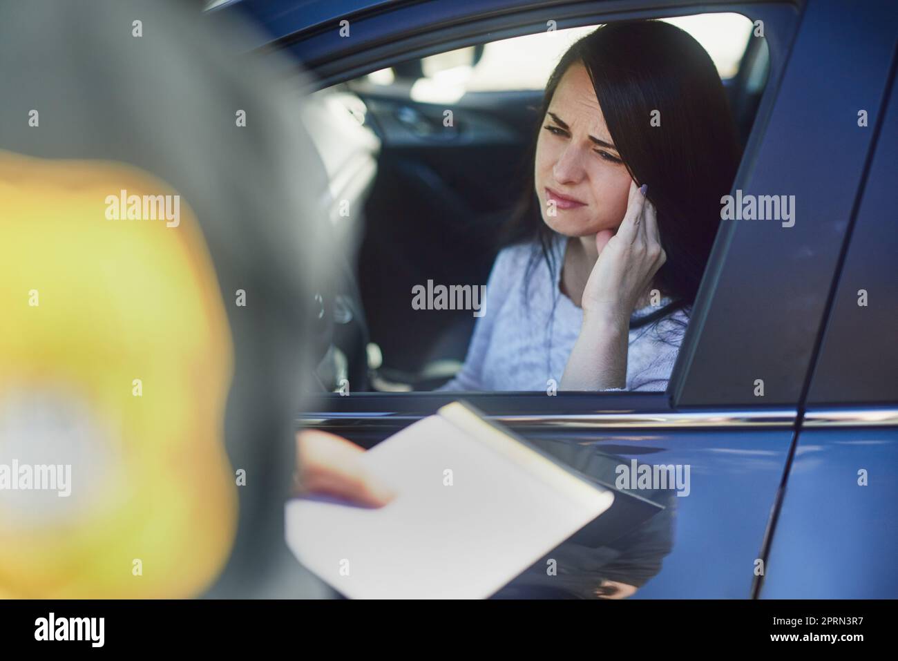 Police issuing ticket driver hi-res stock photography and images - Alamy