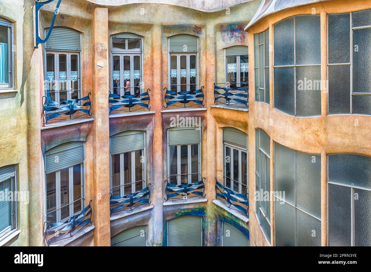 BARCELONA - AUGUST 9: Windows in the inner courtyard of Casa Mila, aka ...