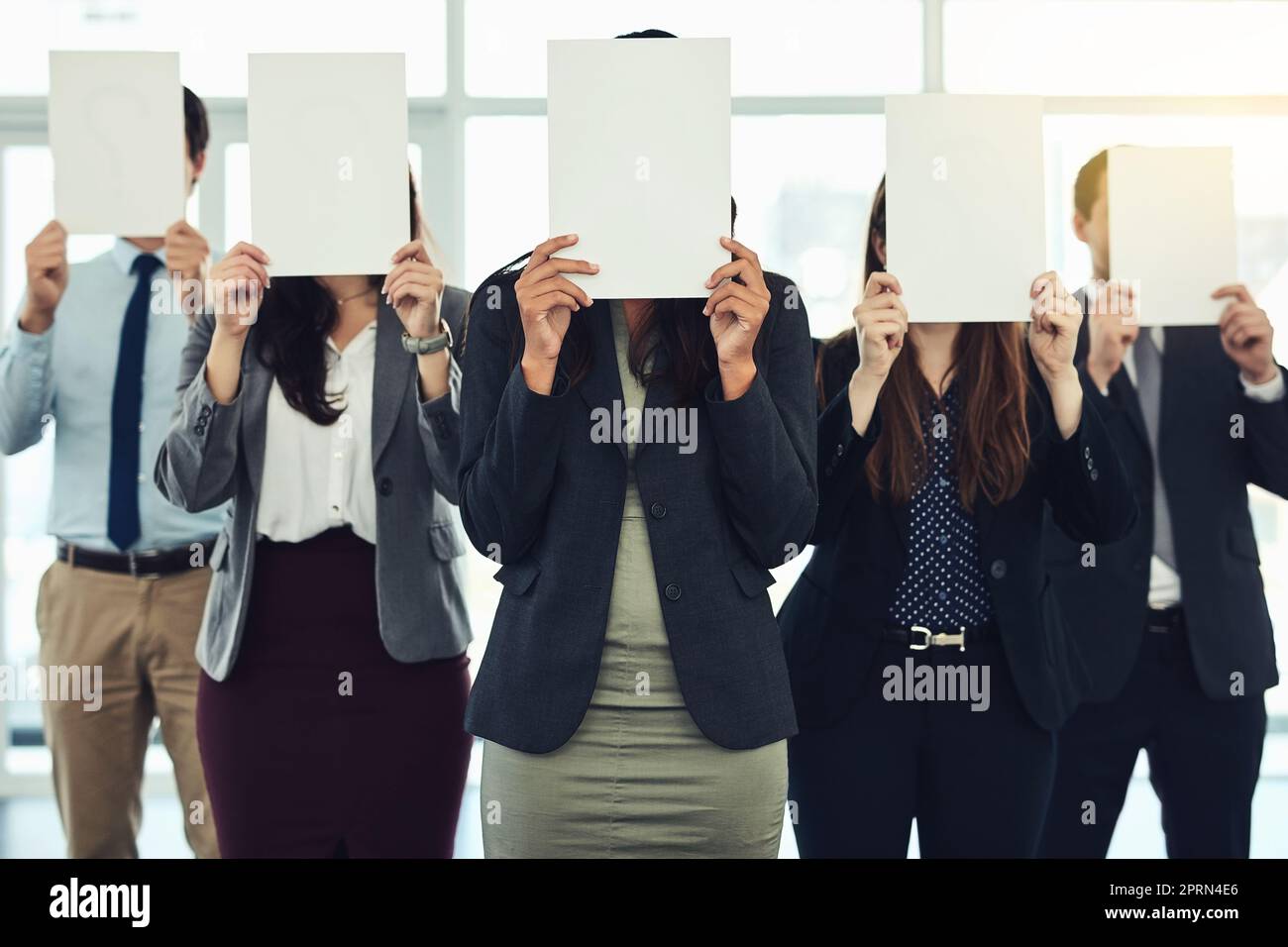 Person hiding in office hi-res stock photography and images - Alamy