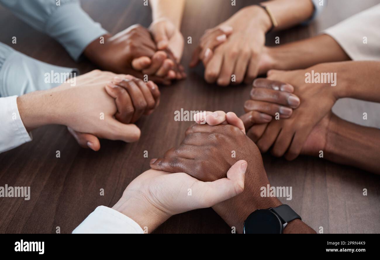 People, holding hands and care in diversity for trust, unity or community support together on a ...