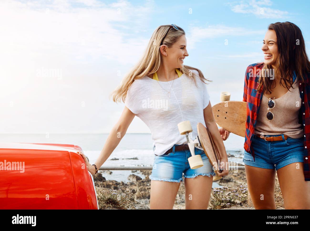 Pulling over for a skate. two friends going skateboarding while on a ...
