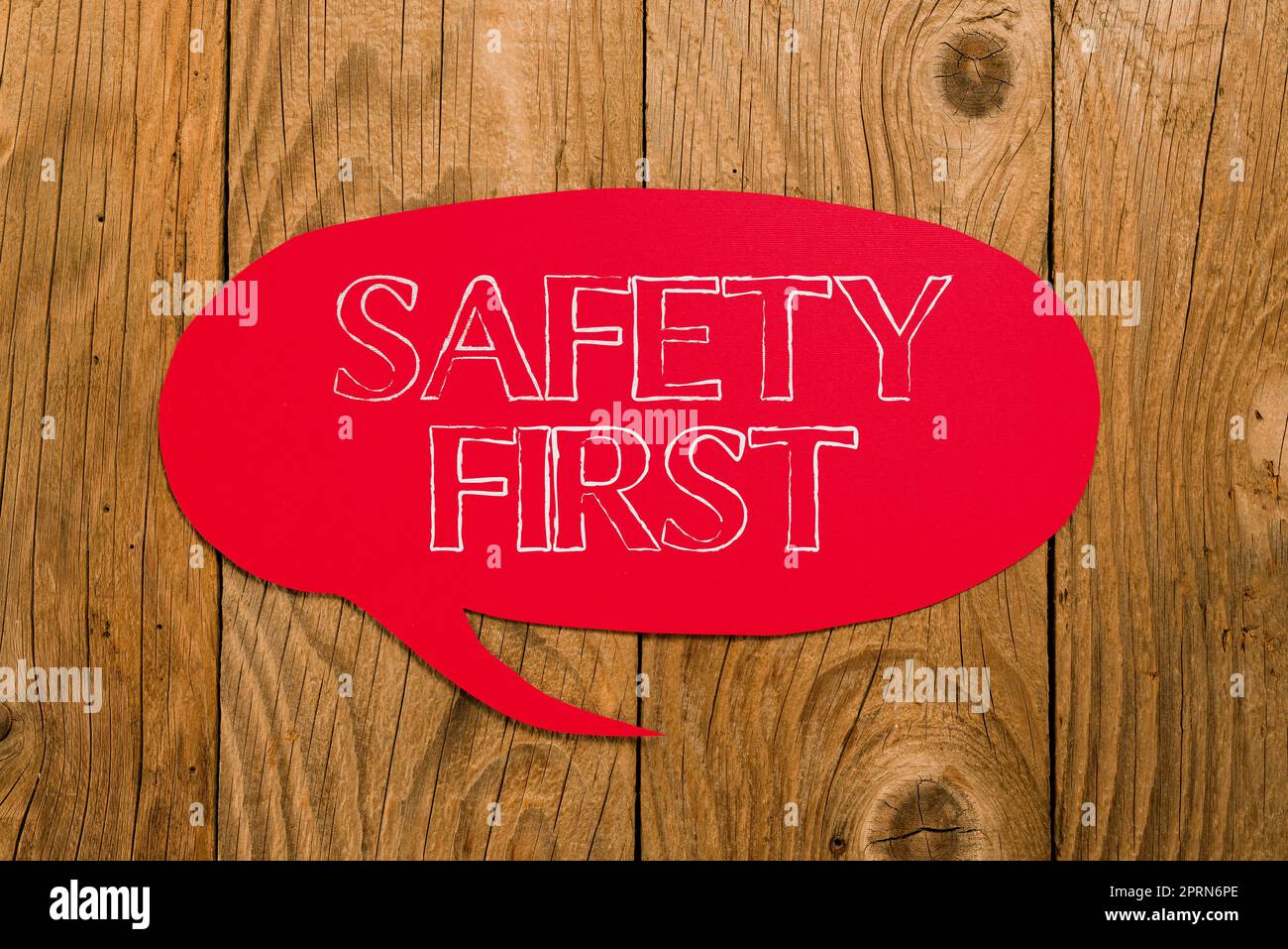 Hand writing sign Safety First, Word for Avoid any unnecessary risk ...