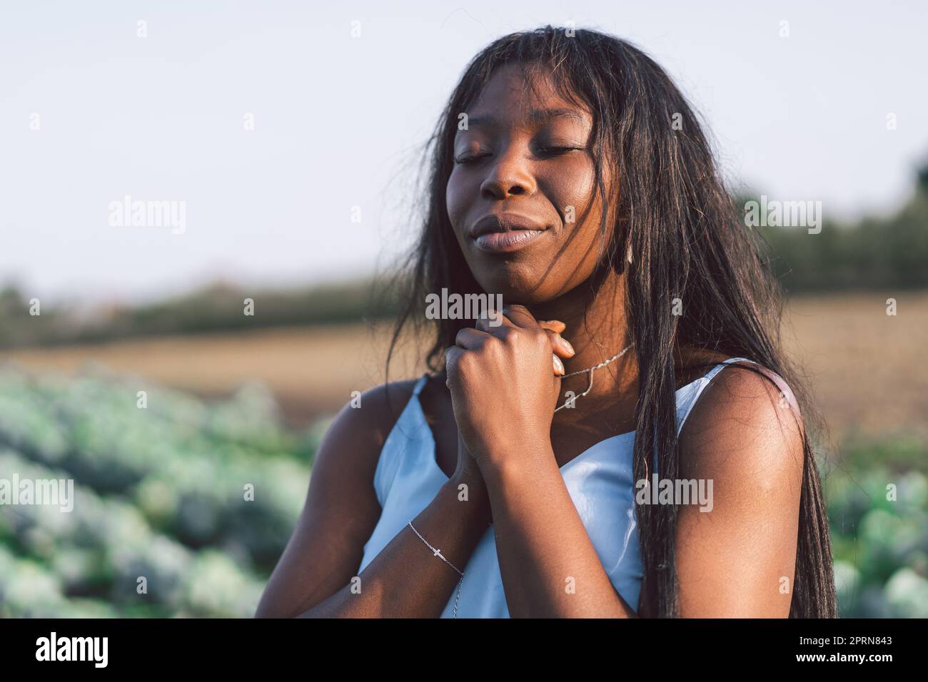 Afro girl closed eyes hi-res stock photography and images - Alamy