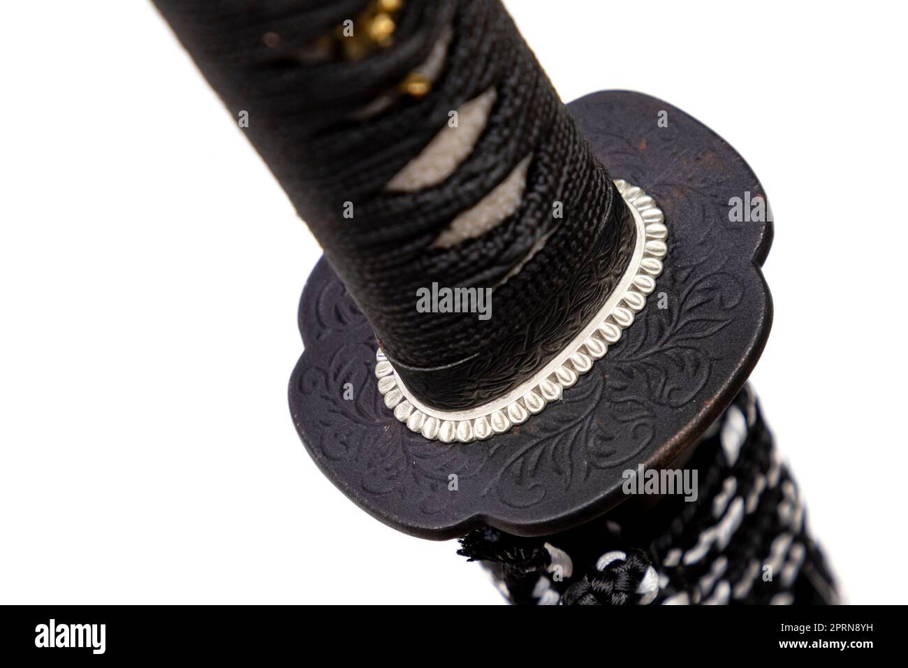 Close up shot of Tsuba - hand guard of Japanese sword made by steel ...