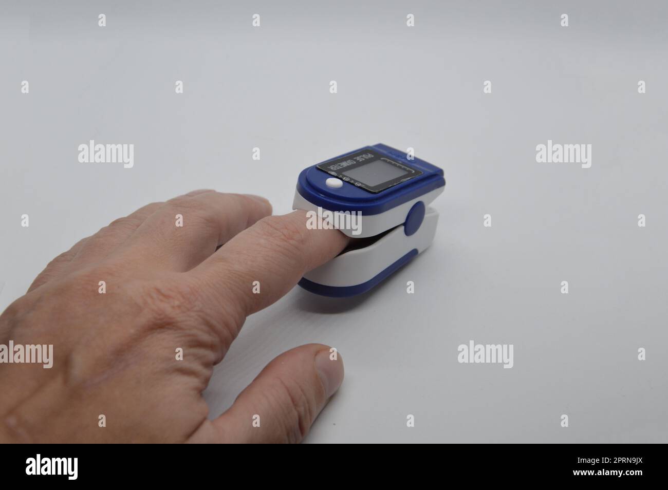 Pulse oximeter device for measuring blood the oxygen level Stock Photo ...