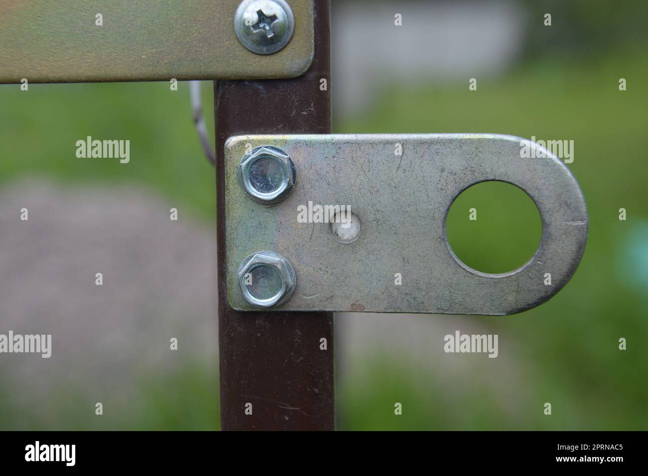 Installing fasteners for installing a he padlock Stock Photo - Alamy