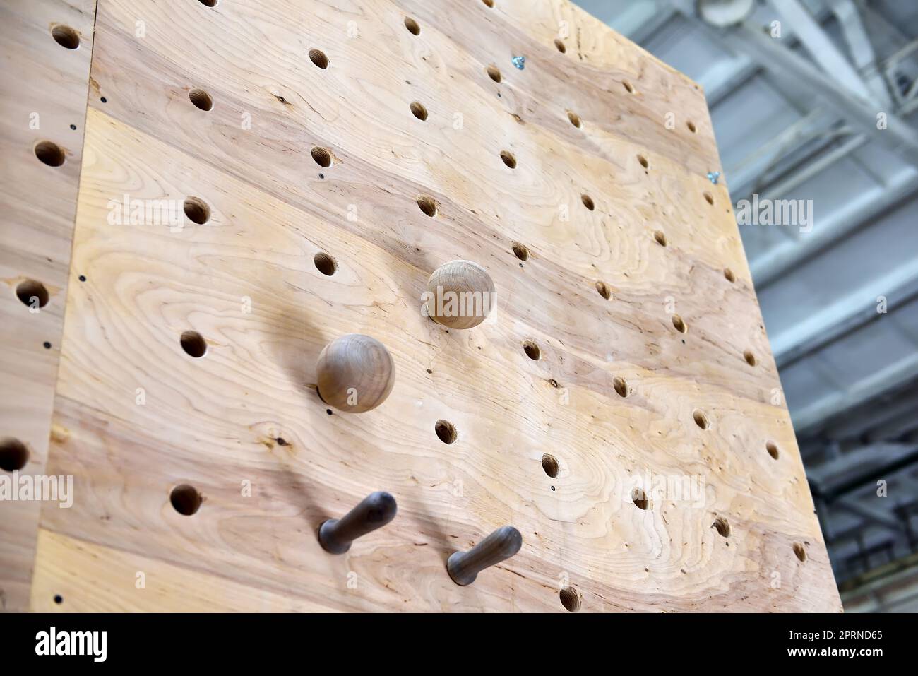 Wooden climbing fingerboard for training. Close up Stock Photo - Alamy