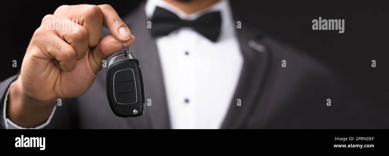 Valet Parking Chauffeur Holding Car Key. African American Butler Stock ...
