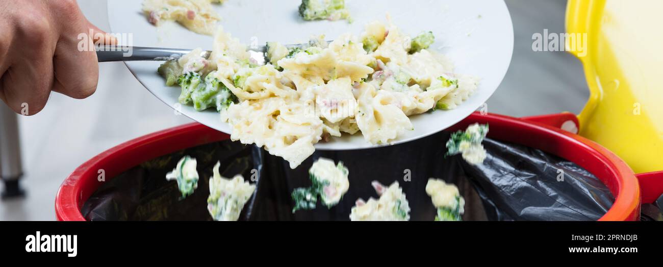 Trash Food Leftover To Trash. Throwing Away Waste Stock Photo - Alamy