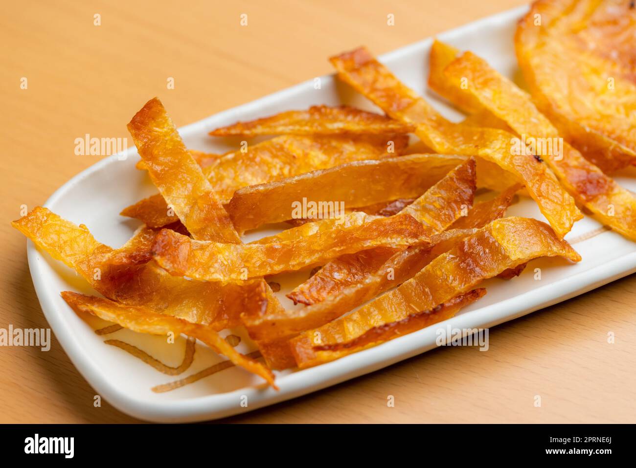 Cooked dried fish fillet snack Stock Photo - Alamy