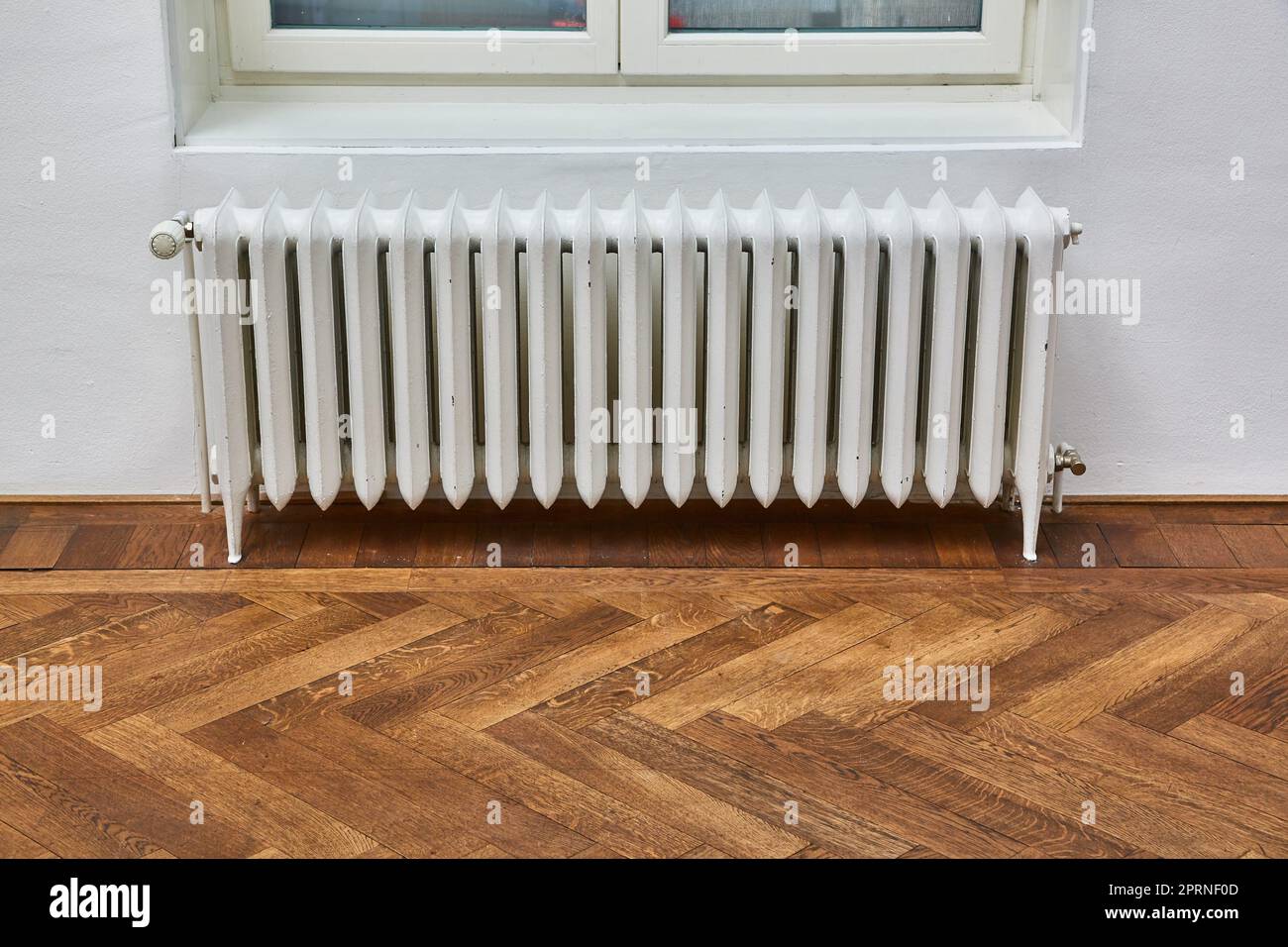 Heating radiator in an indoor space Stock Photo - Alamy
