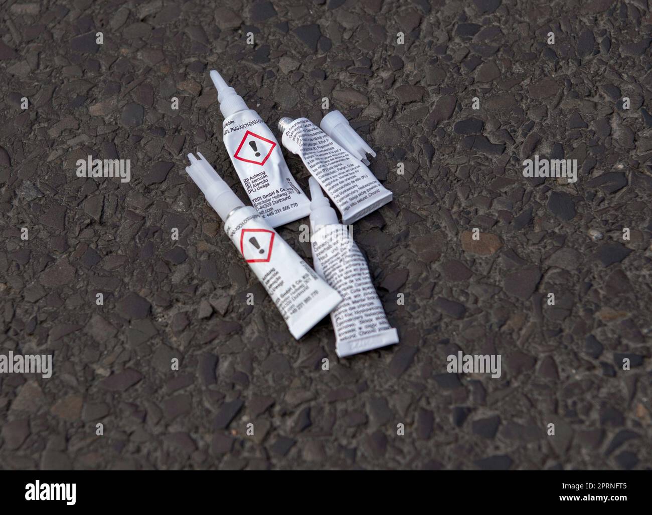 Berlin, Germany. 27th Apr, 2023. Empty glue tubes lie at an ...