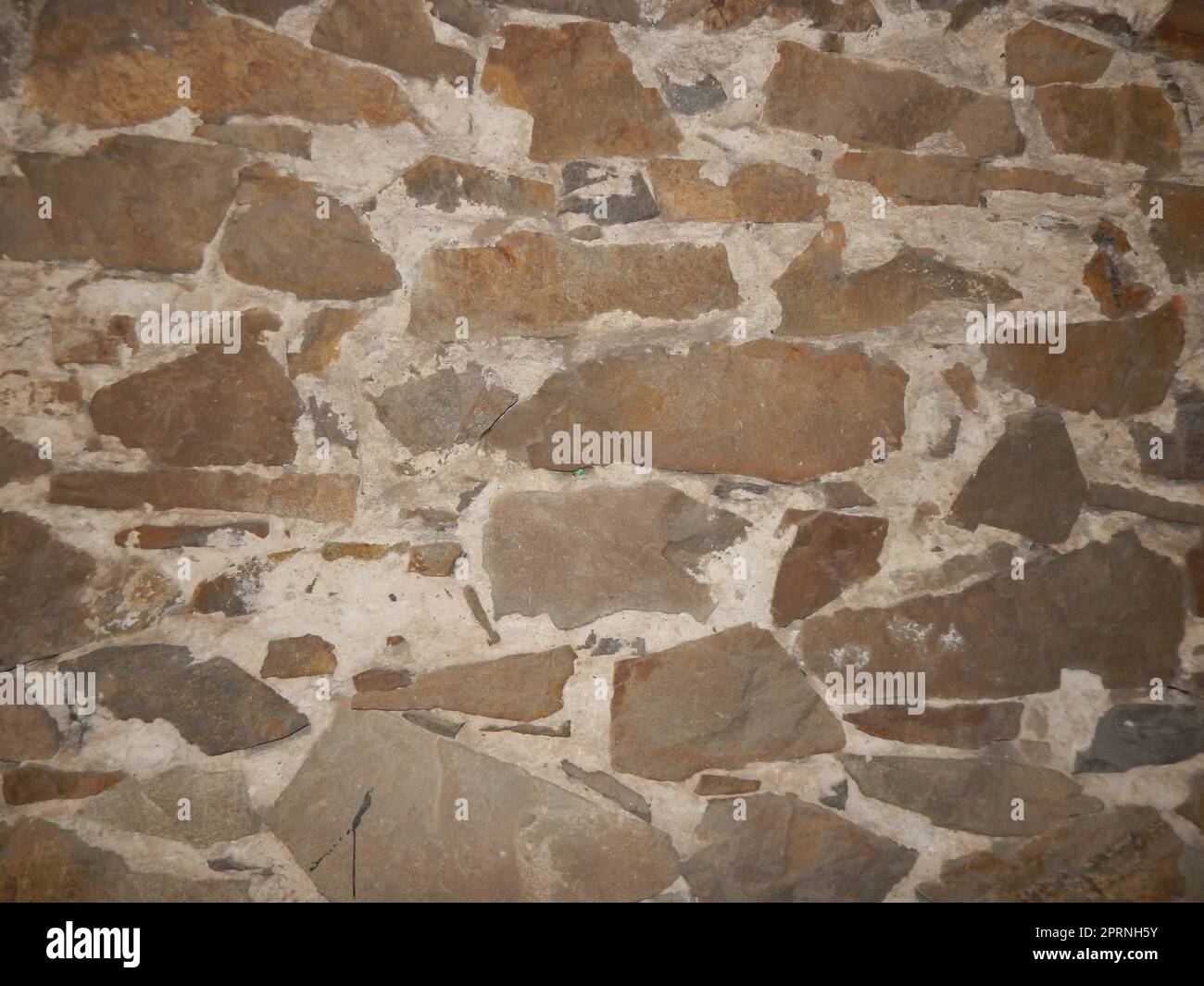 The texture of stone and brick paving and walls Stock Photo - Alamy