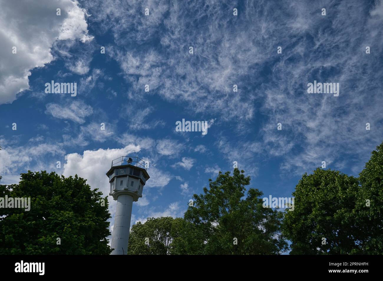 An old watchtower with searchlight at the former border of the GDR ...