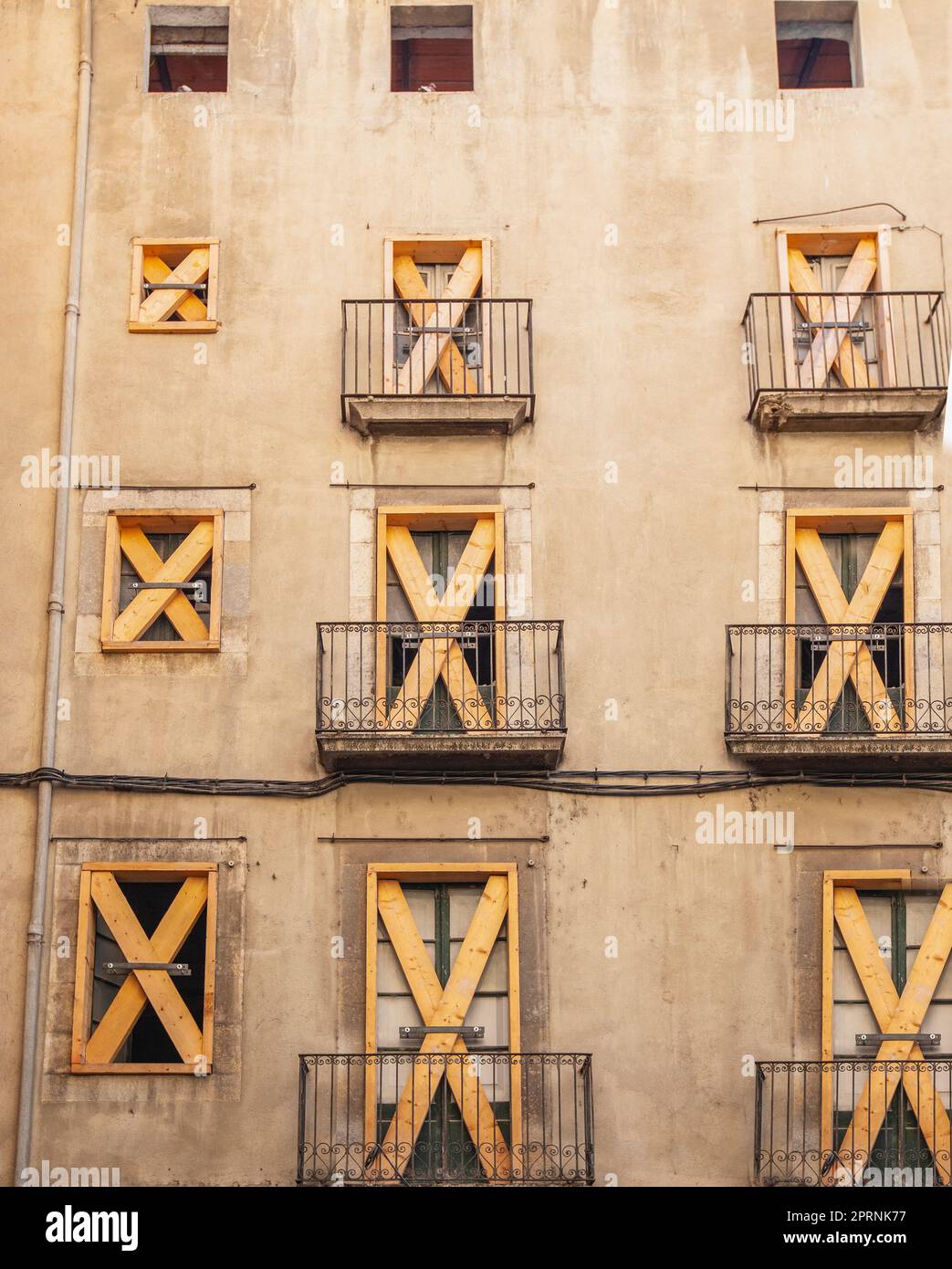 Old abandoned high-rise building with boarded up windows Stock Photo ...
