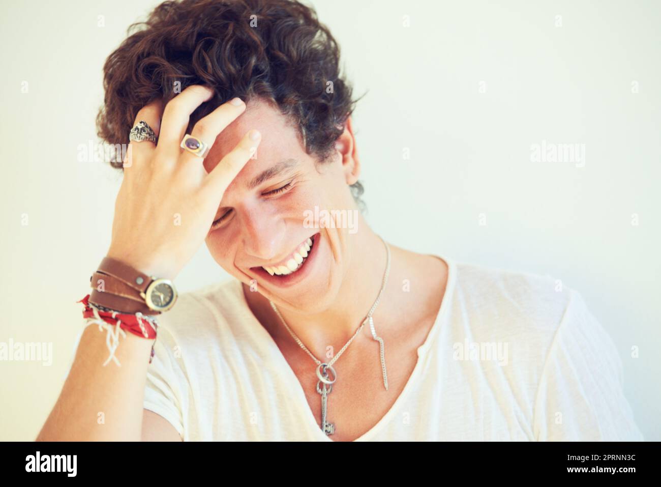 Man running hand through hair hi-res stock photography and images - Alamy