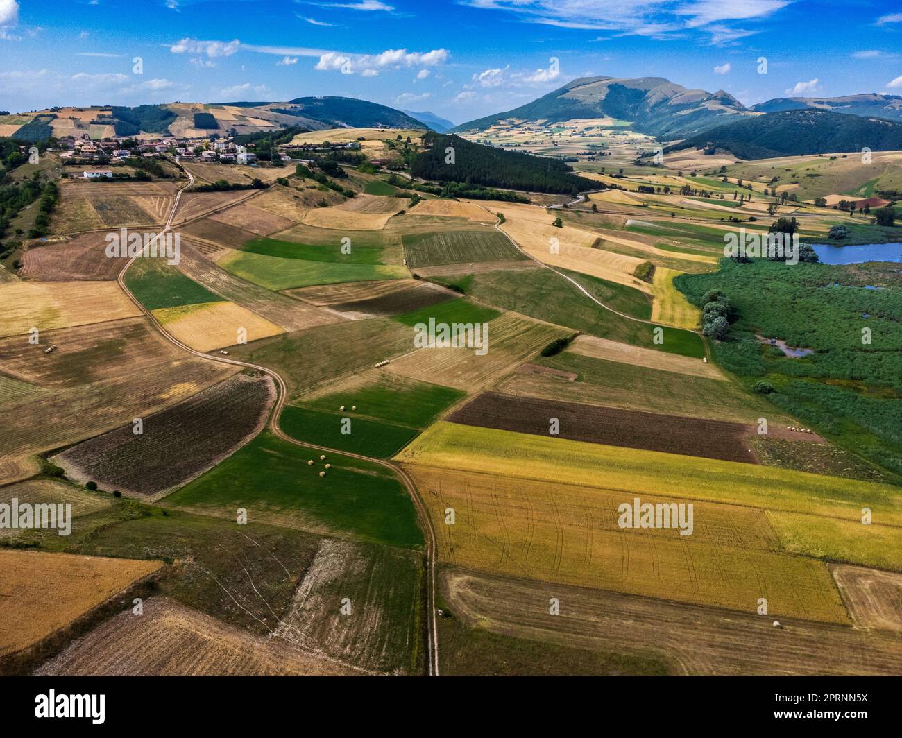 Colfiorito, Umbria. Fields and crops. Play of colors seen from above ...