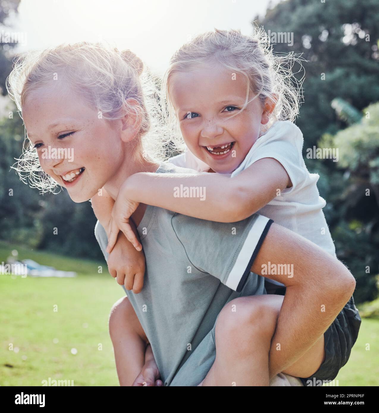Happy, smile and siblings in an outdoor park during summer having fun ...