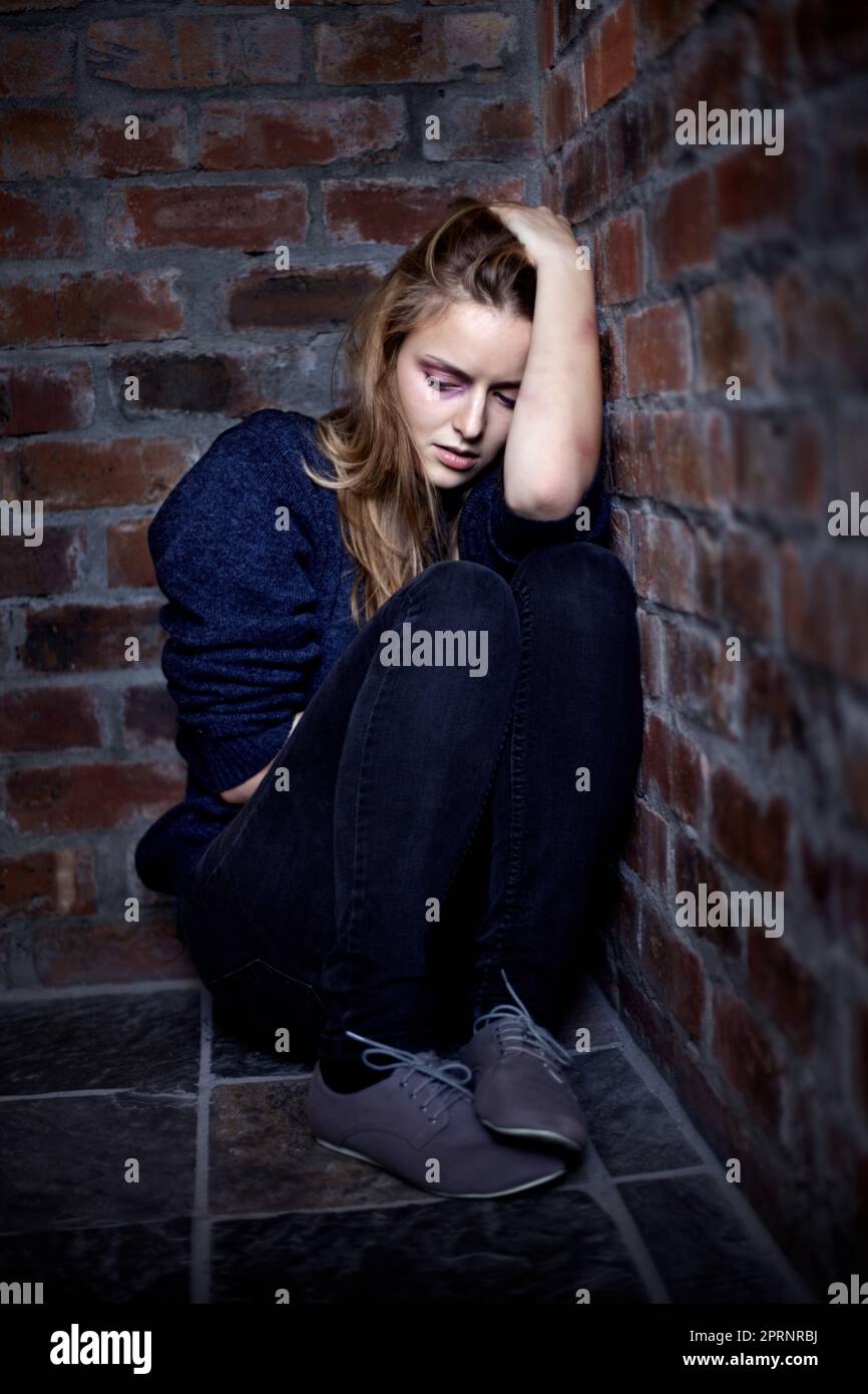 Crouched in corner hi-res stock photography and images - Alamy