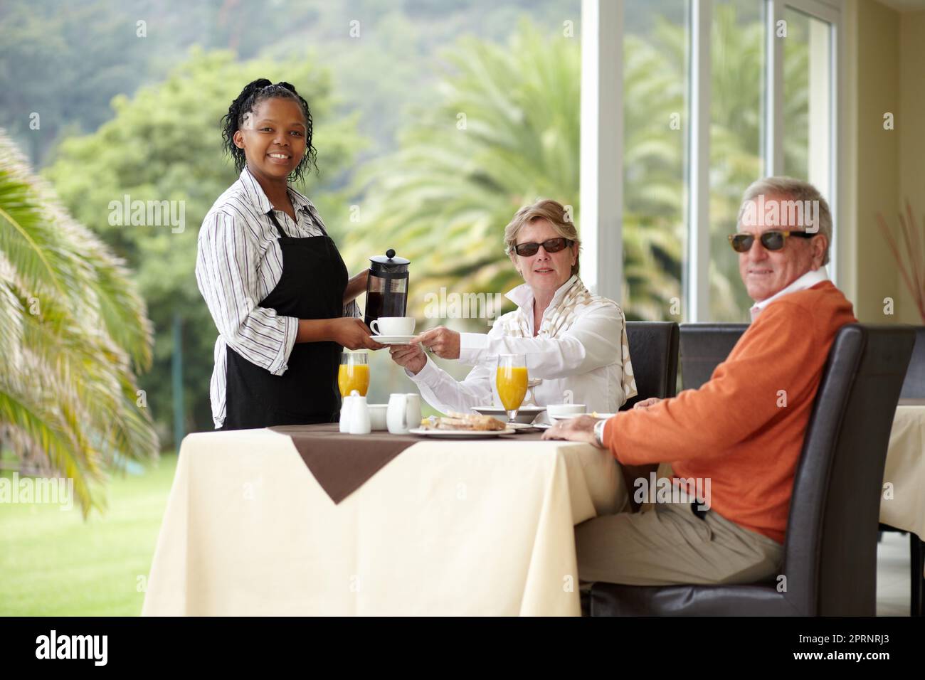 Couple being served in restaurant hi-res stock photography and images ...