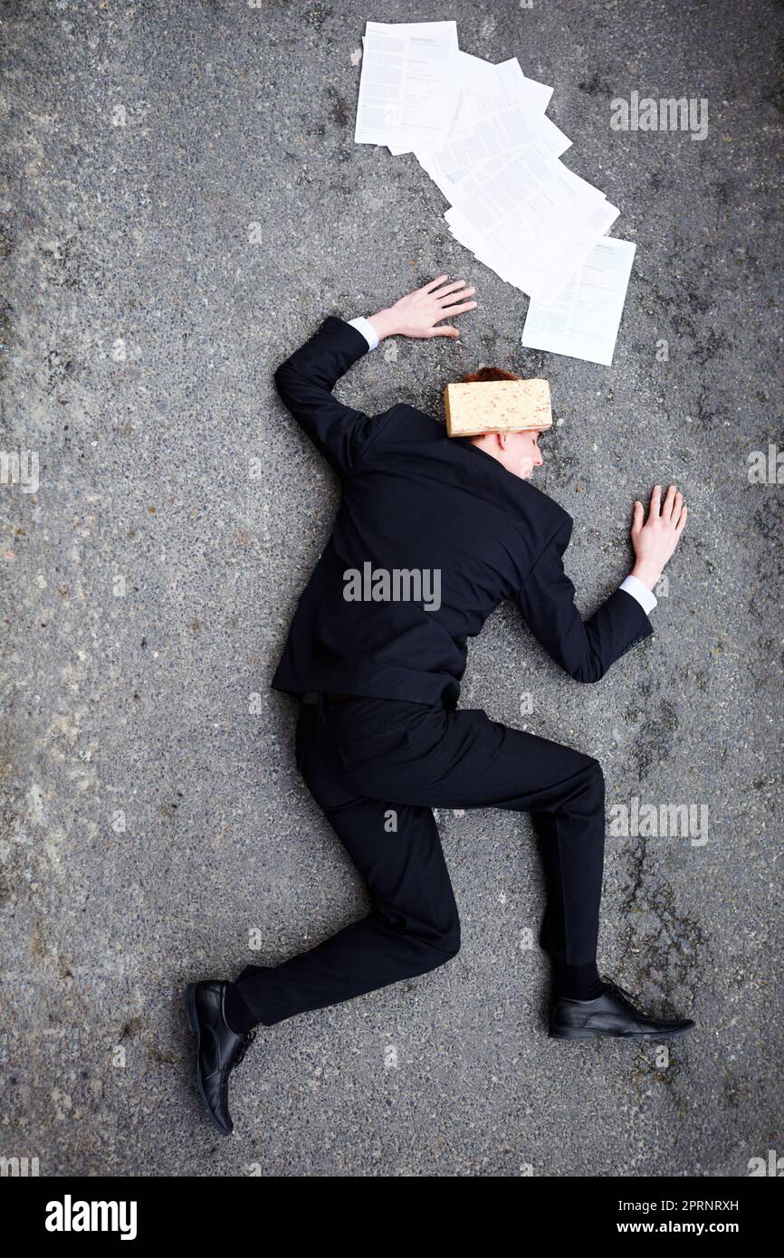 Dead man lying on the ground hi-res stock photography and images - Alamy