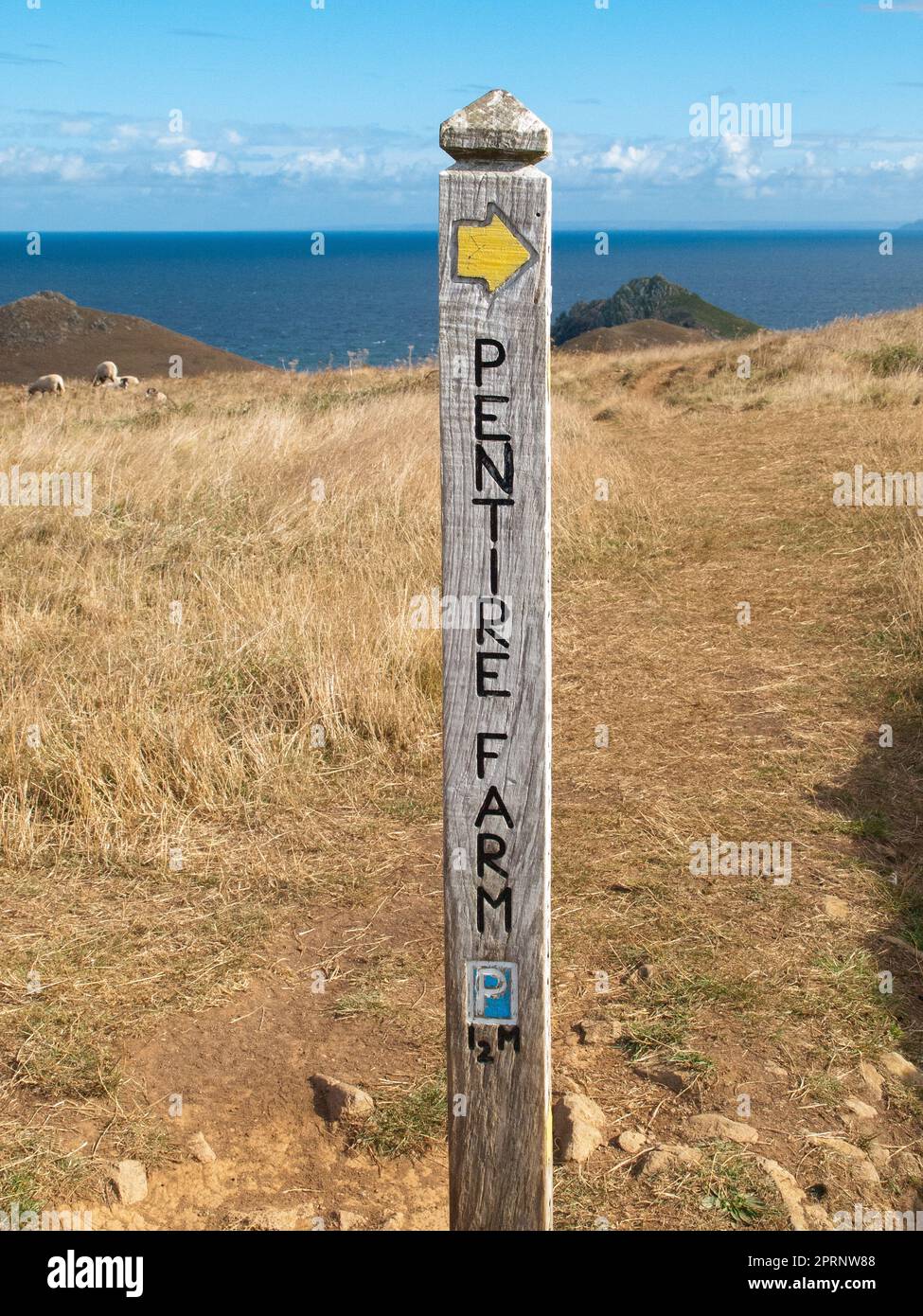 Single signpost shows to Pentire Farm on the cornish SW Coast Path ...