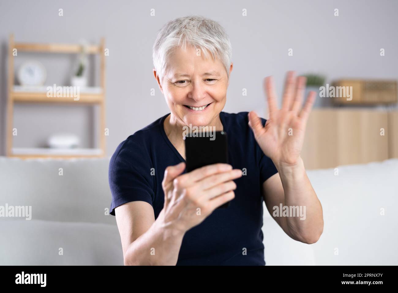 Video chat talking senior lady hi-res stock photography and images - Alamy