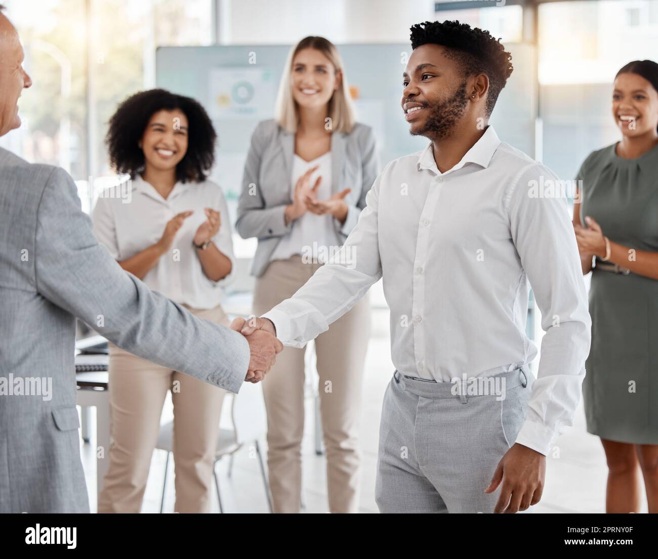Boss employee handshake hi-res stock photography and images - Alamy