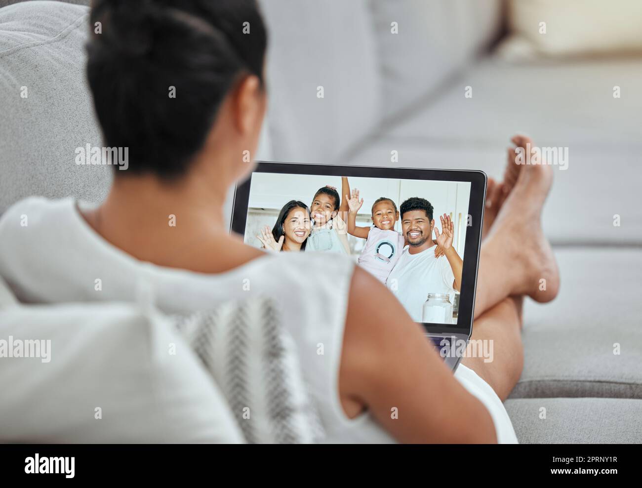 Woman, video call and tablet screen talking to family, wave hello and ...