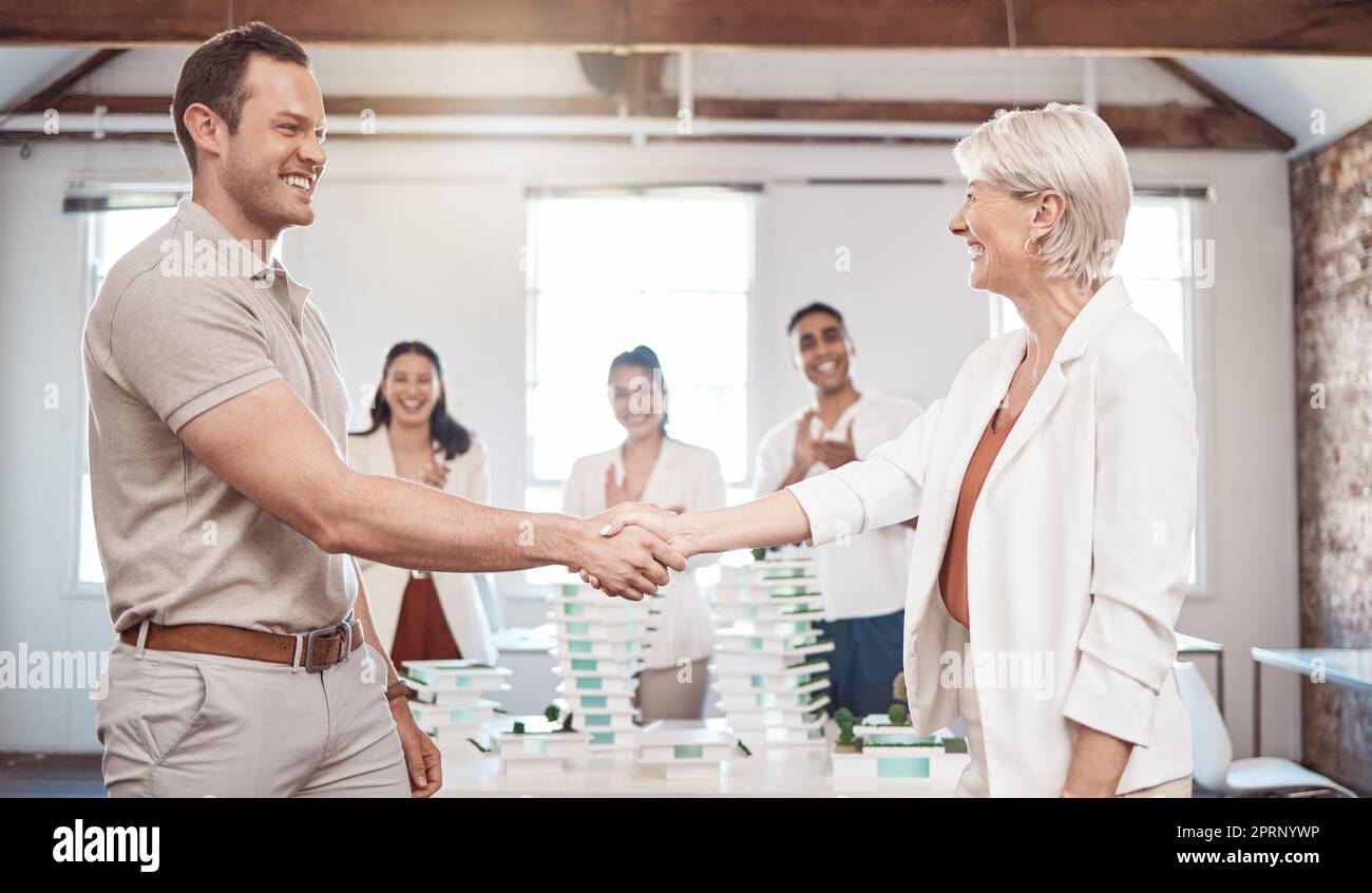 Architect, business handshake and partnership meeting of people in ...