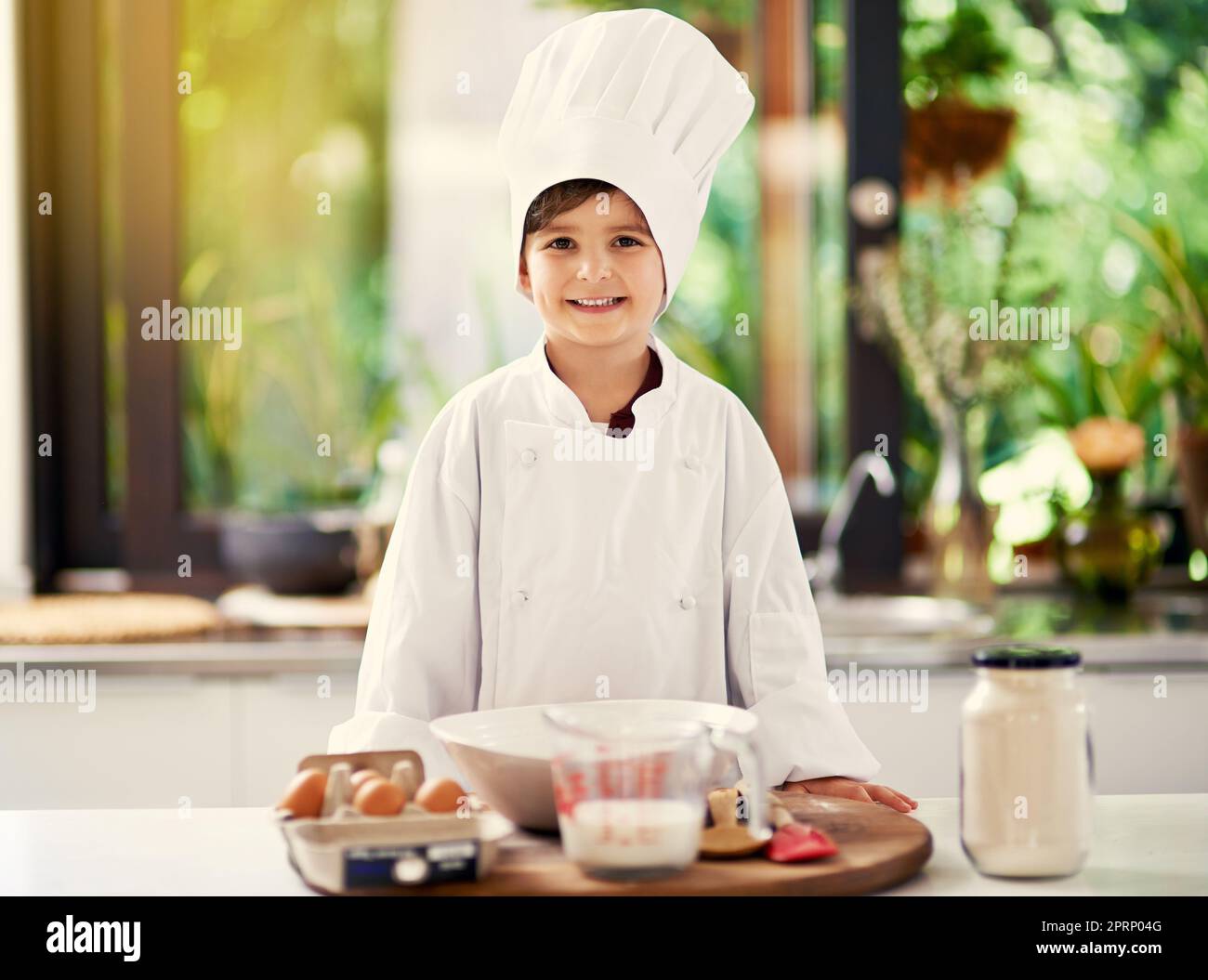 Kids cooking playing hi-res stock photography and images - Alamy