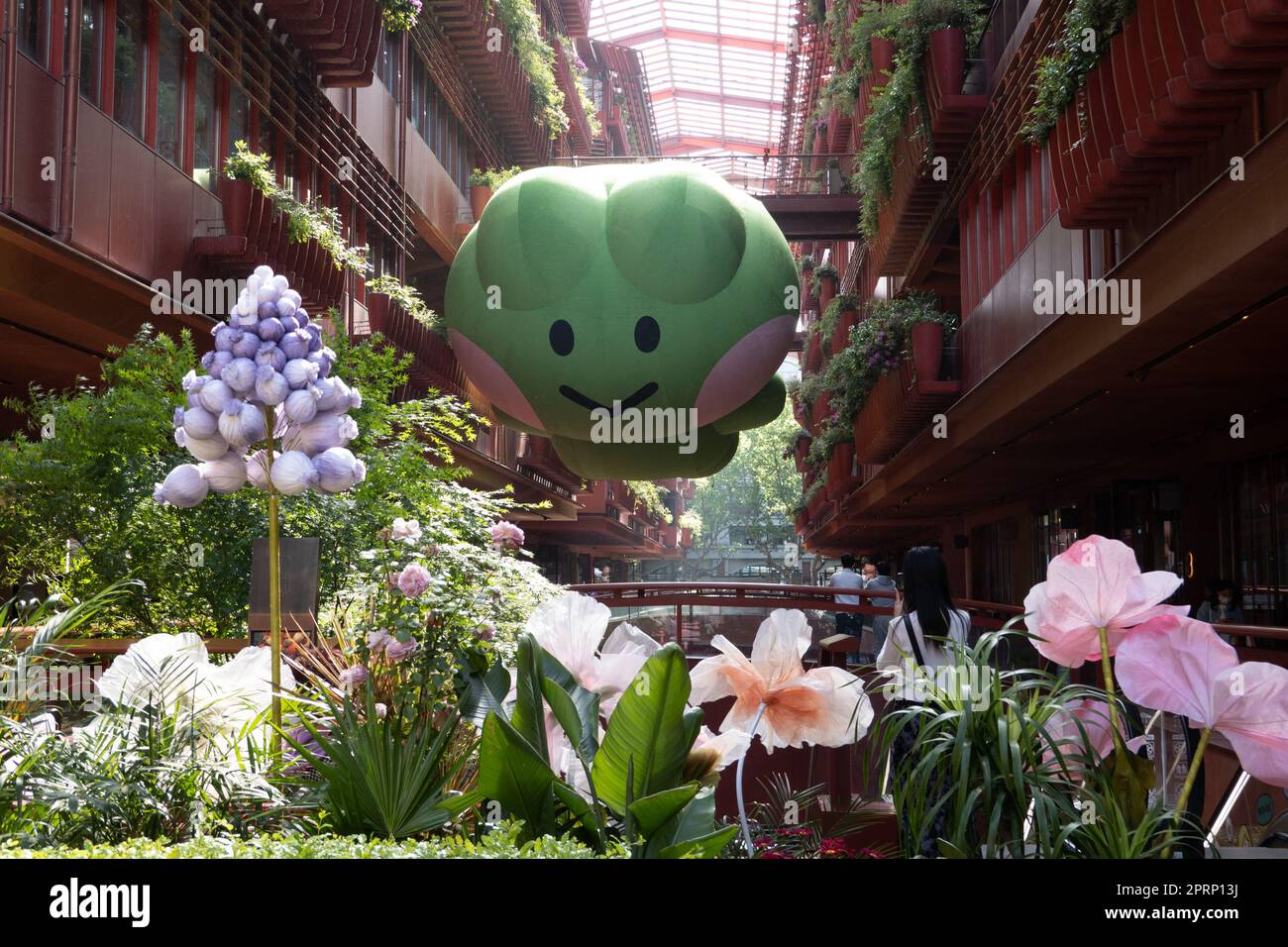 SHANGHAI, CHINA - APRIL 27, 2023 - A giant "frog" hangs in the air at a ...