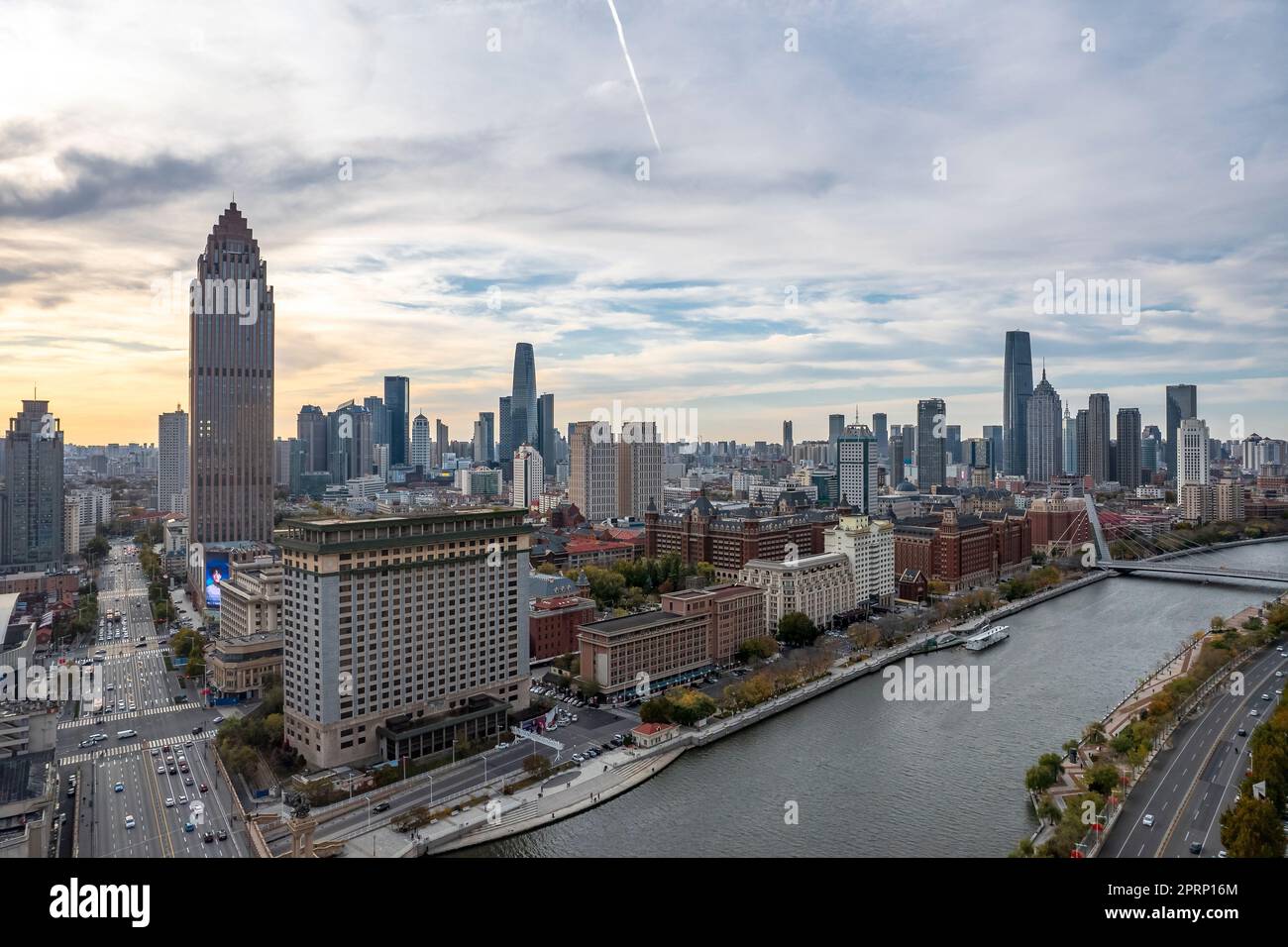 Urban Scenery of Riverside City in the Morning, Noon and Evening Stock ...