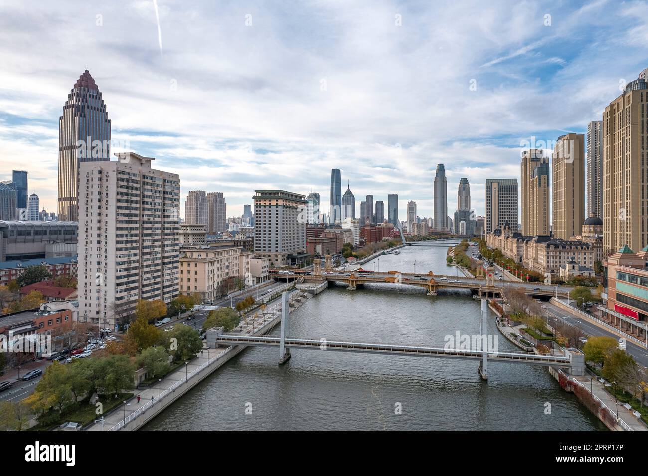 Urban Scenery of Riverside City in the Morning, Noon and Evening Stock ...