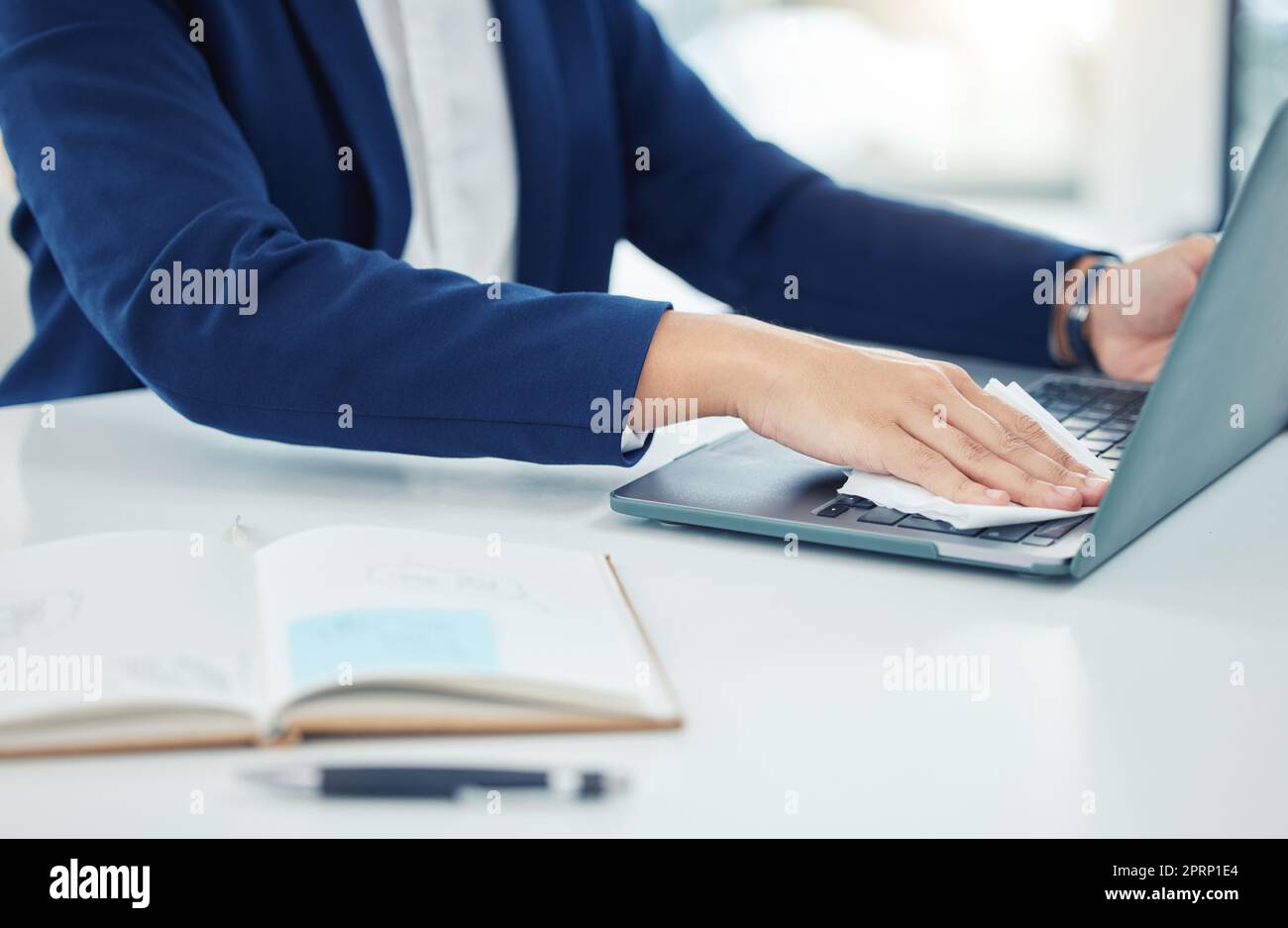 Business person clean laptop with tissue, care for desk and workspace ...