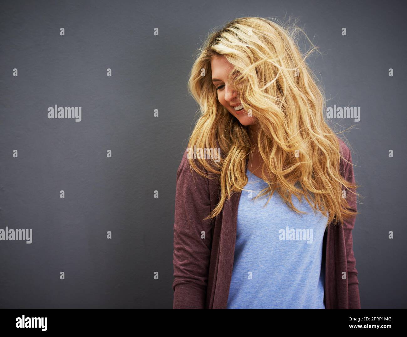 Coy smile hi-res stock photography and images - Alamy