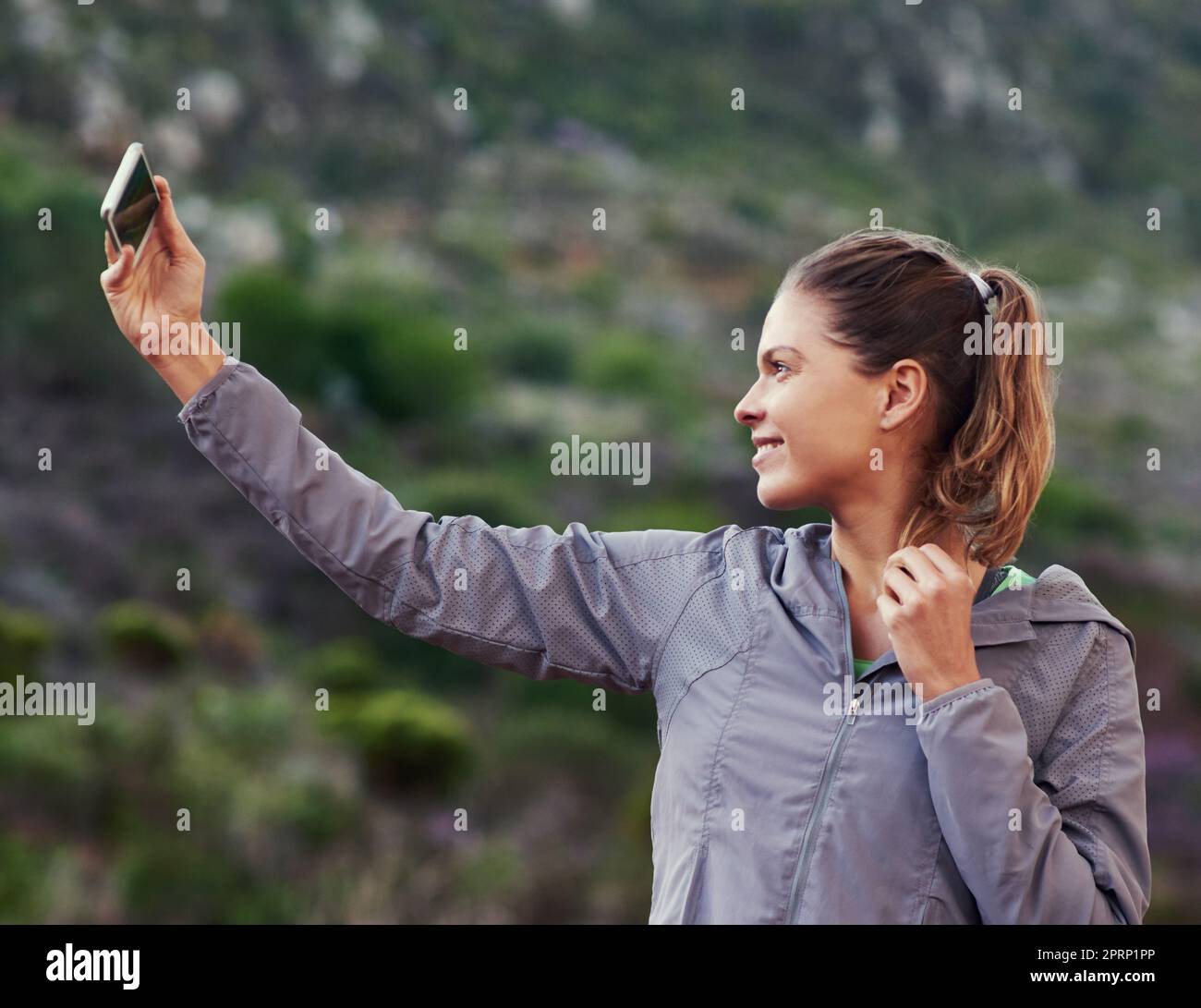 One more run selfie before the trail. a young woman taking a selfie ...