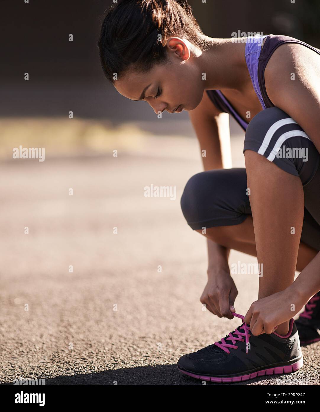 Runner is tying shoes hi-res stock photography and images - Alamy