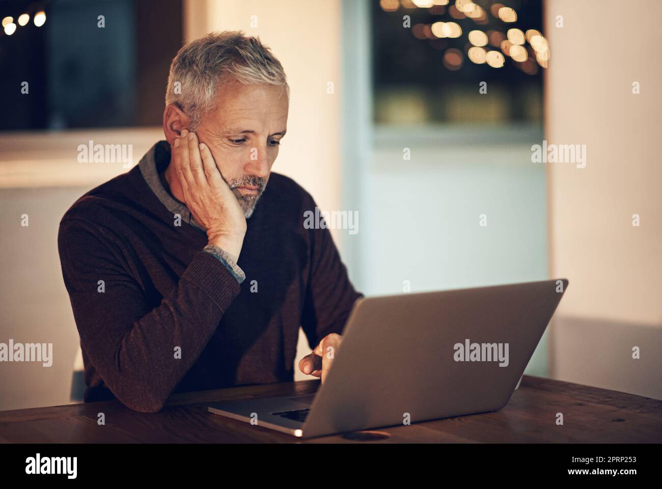 Tired businessman working late hi-res stock photography and images - Alamy