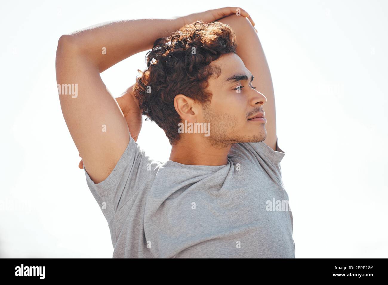 Man stretching arms hi-res stock photography and images - Alamy