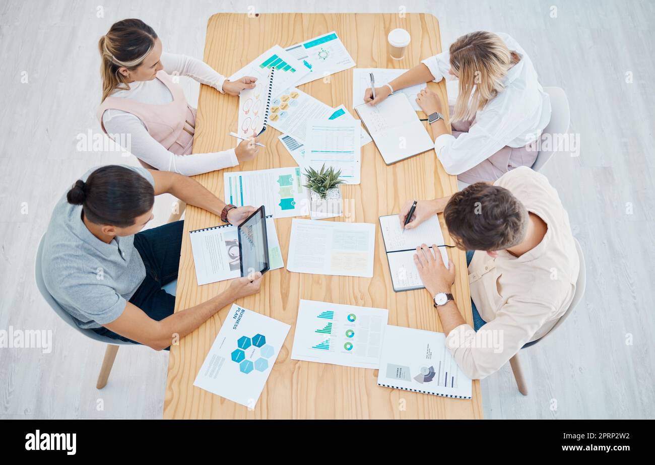 Marketing, advertising and team planning, strategy and paperwork above in a meeting at the ...