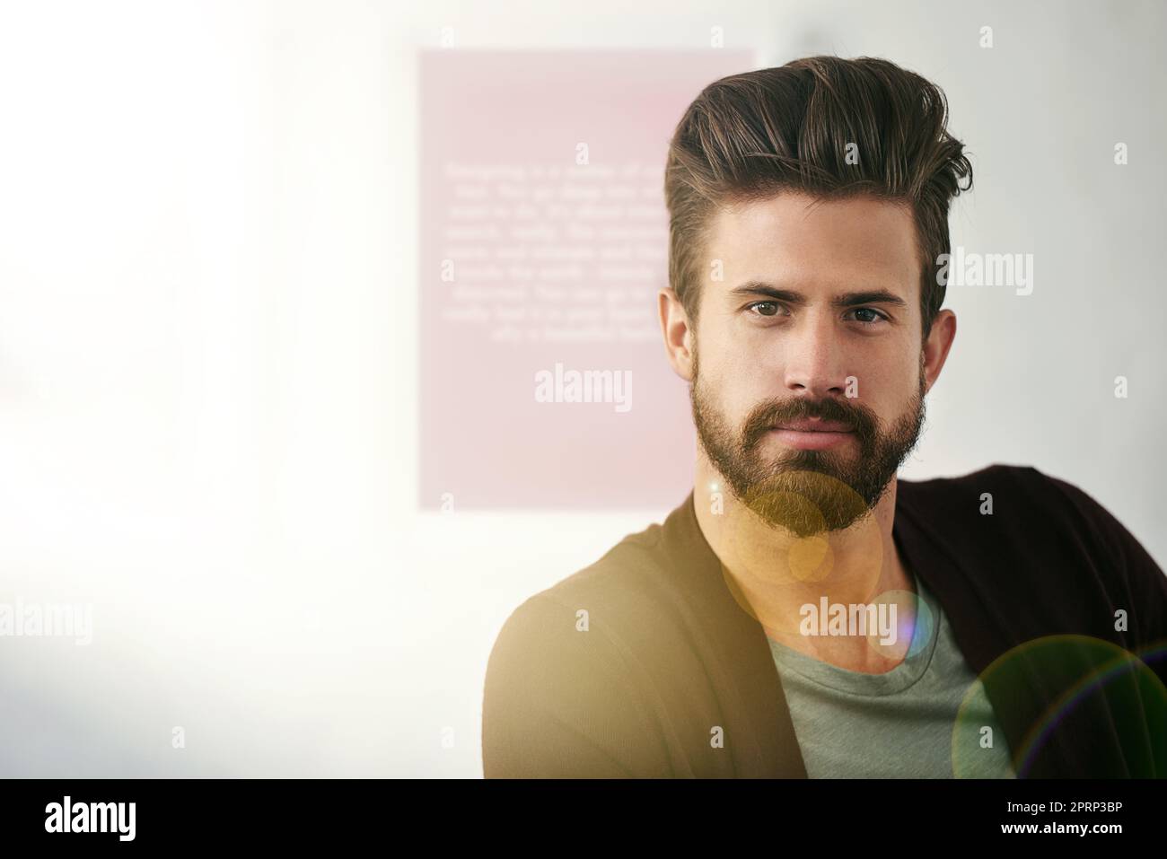 Success and nothing less. a young designer at the office Stock Photo ...