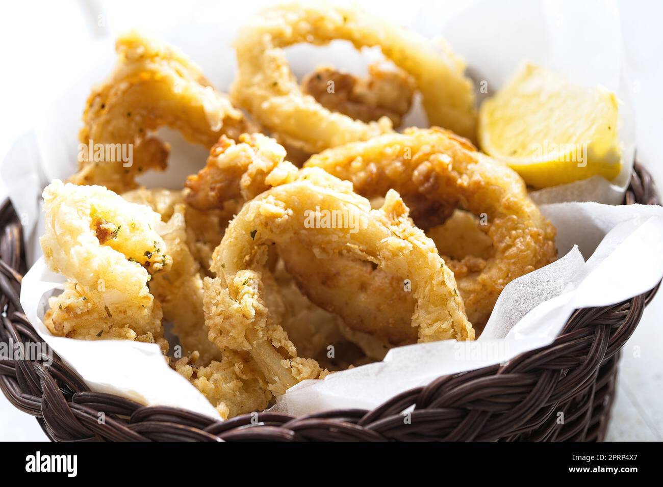 golden italian fried calamari Stock Photo - Alamy