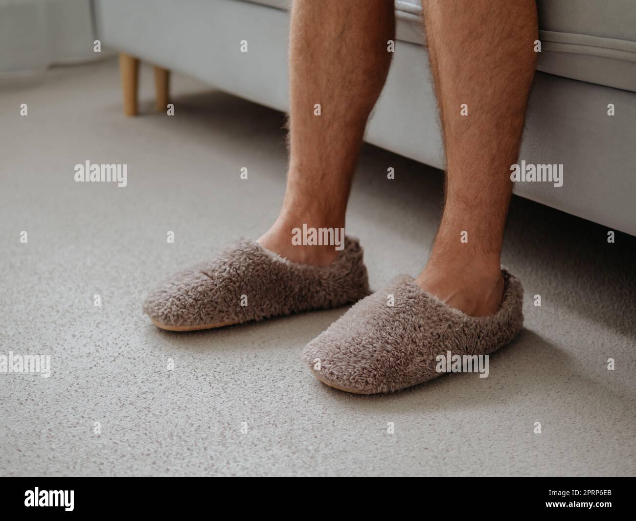 Man wearing slippers hi-res stock photography and images - Alamy