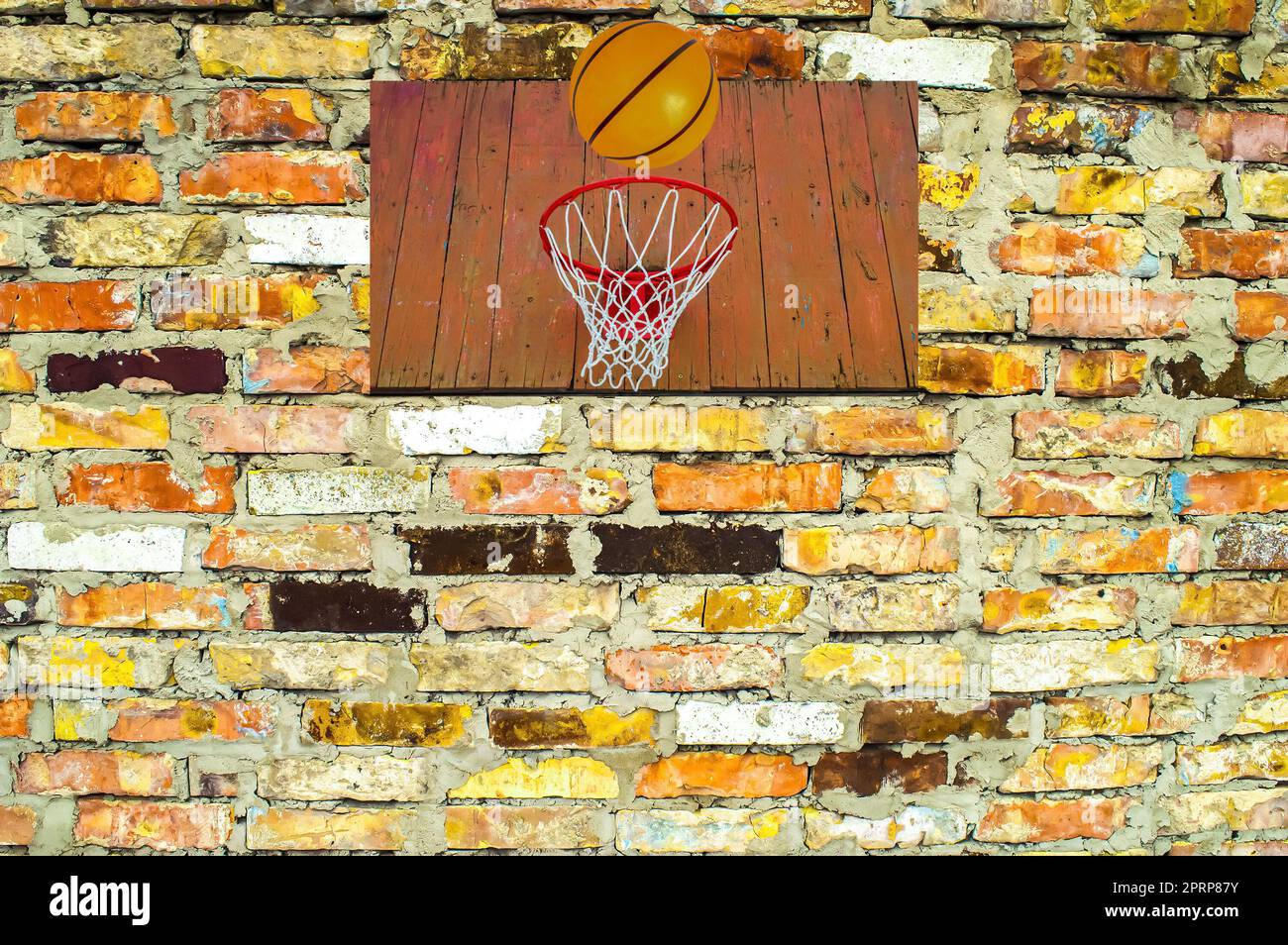 The basketball ball flies into the ring. Basketball backboard with ...
