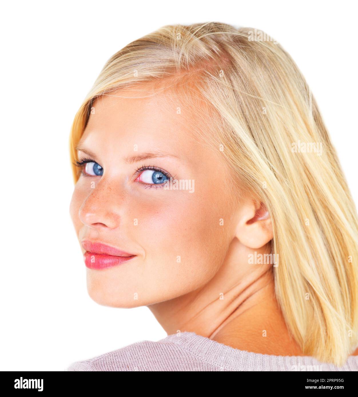 Perfectly pretty. Gorgeous young blond woman smiling happily against a ...